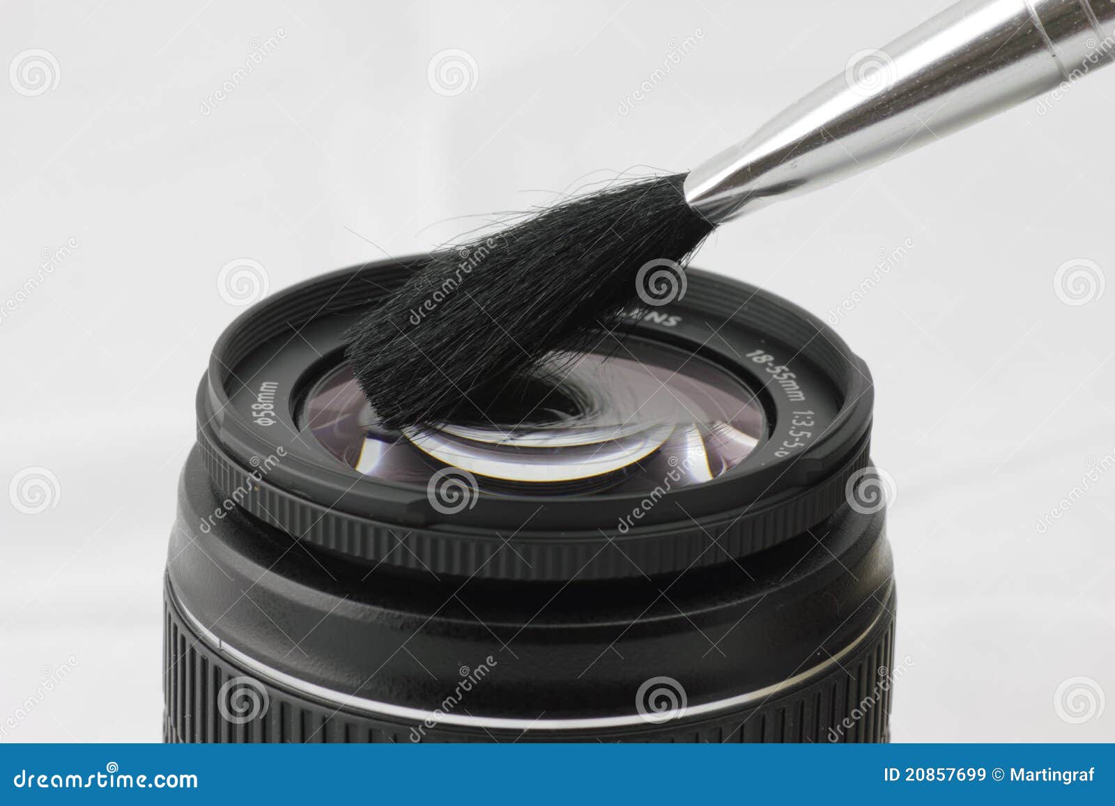 Cleaning a lens stock image. Image of detail, equipment - 20857699