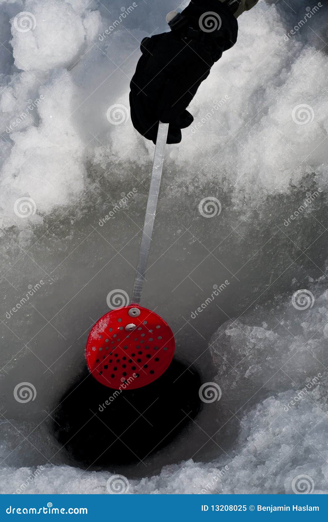 Cleaning Out a Hole for Ice Fishing Stock Image - Image of auger ...