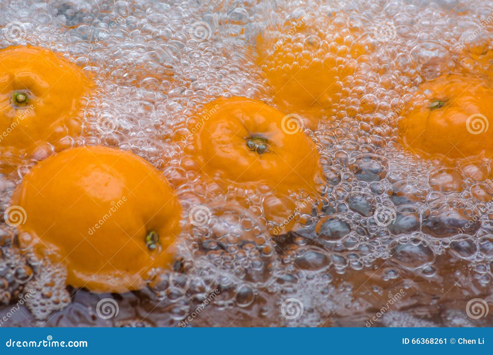 The Cleaning Process of Oranges Stock Image - Image of color, process ...