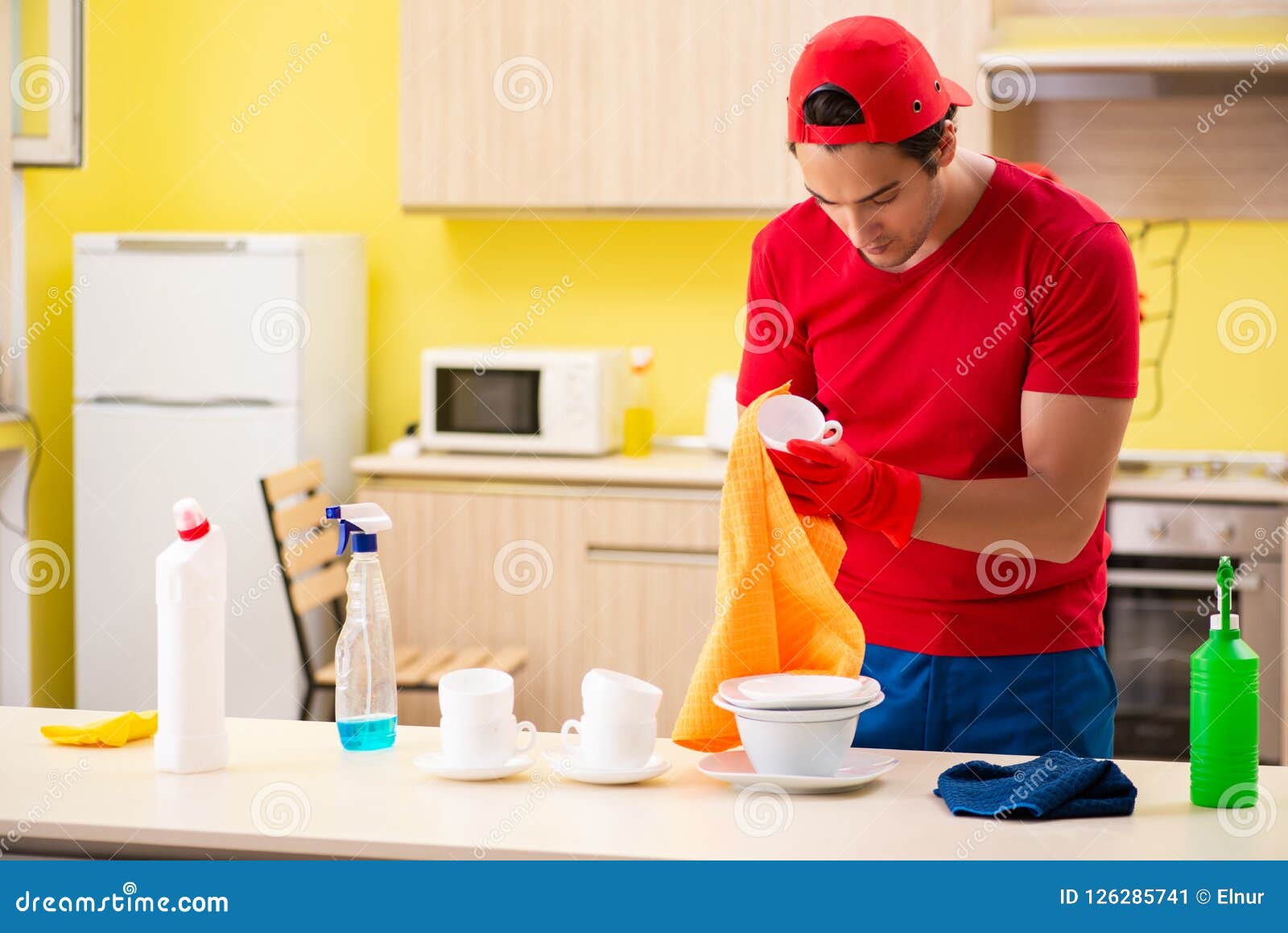 The Cleaning Professional Contractors Working at Kitchen Stock Image ...