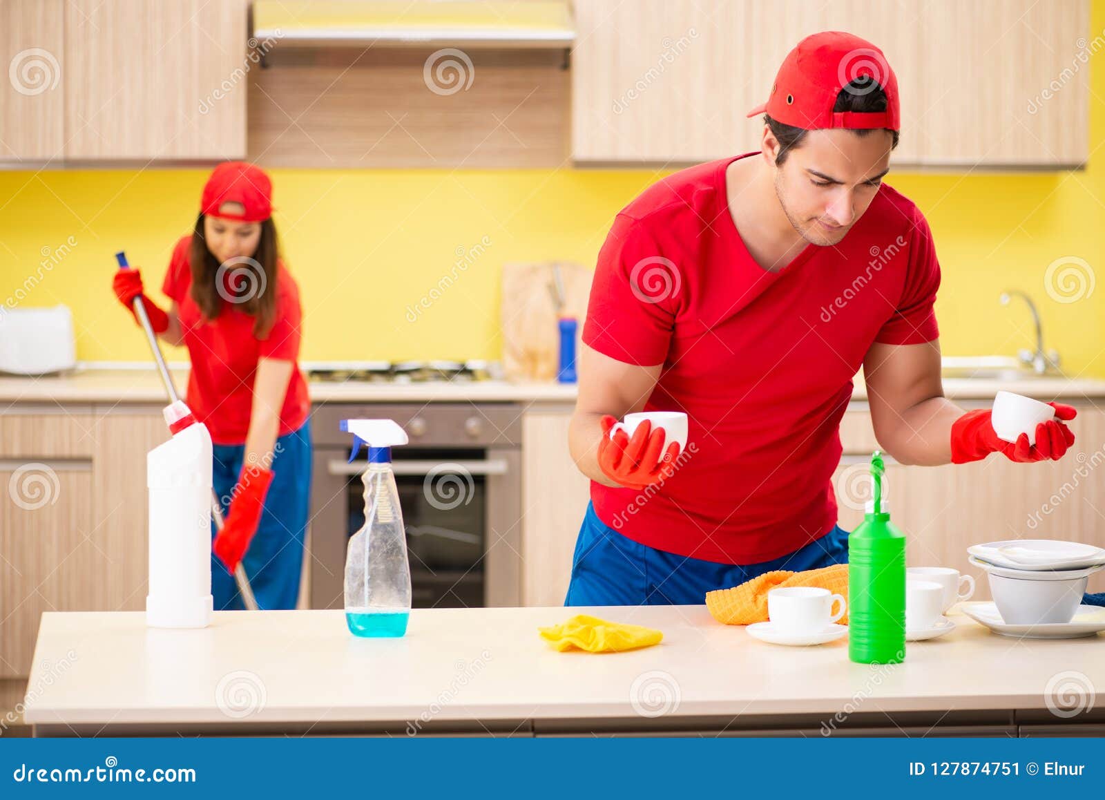 The Cleaning Professional Contractors Working at Kitchen Stock Image ...
