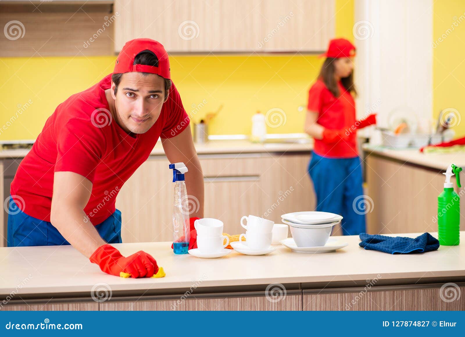 The Cleaning Professional Contractors Working at Kitchen Stock Image ...