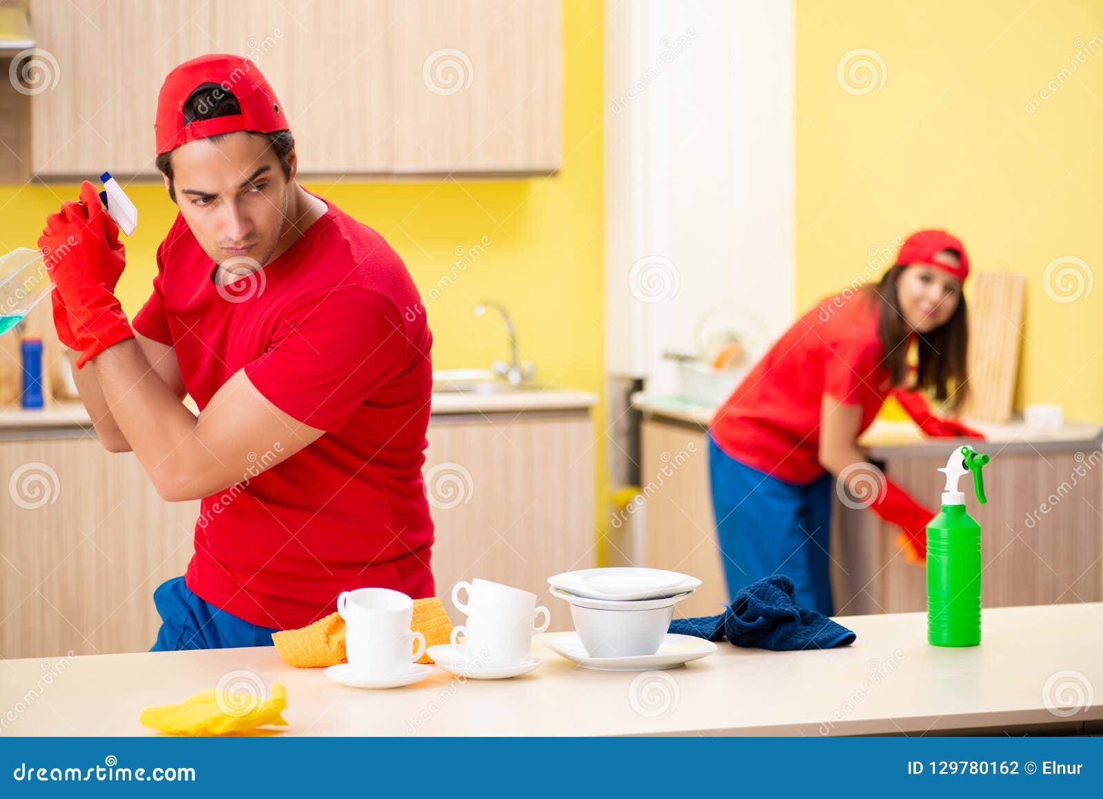 The Cleaning Professional Contractors Working at Kitchen Stock Photo ...