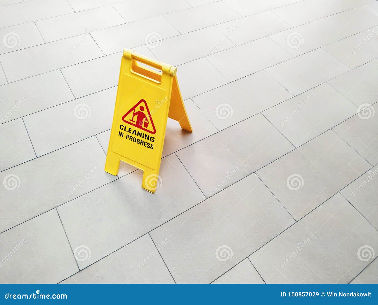 Cleaning in progress sign stock image. Image of yellow - 150857029