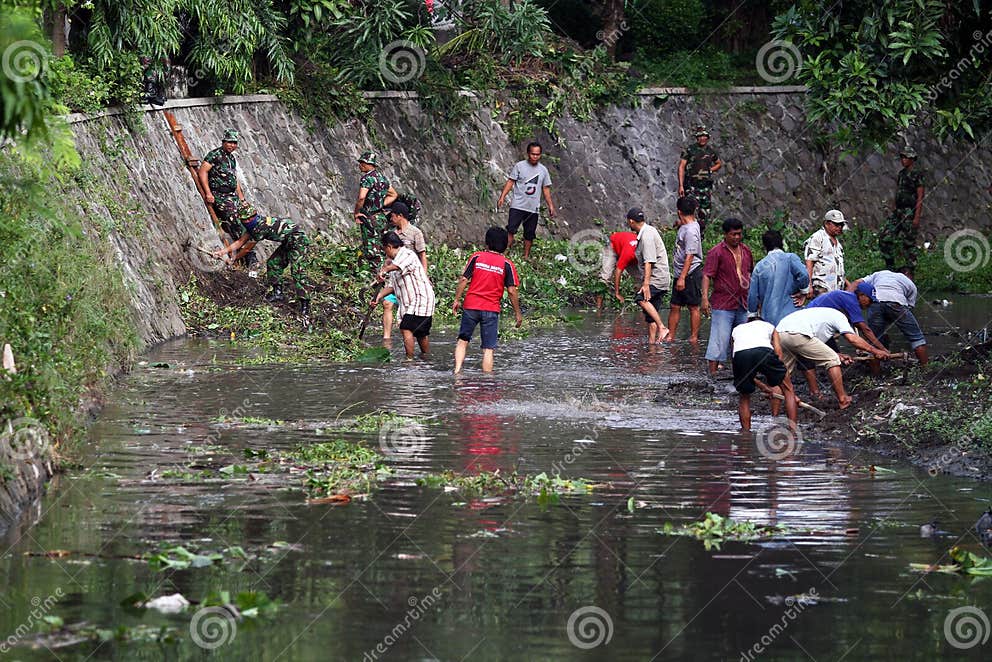 Cleaning the river editorial stock photo. Image of solo - 37095953
