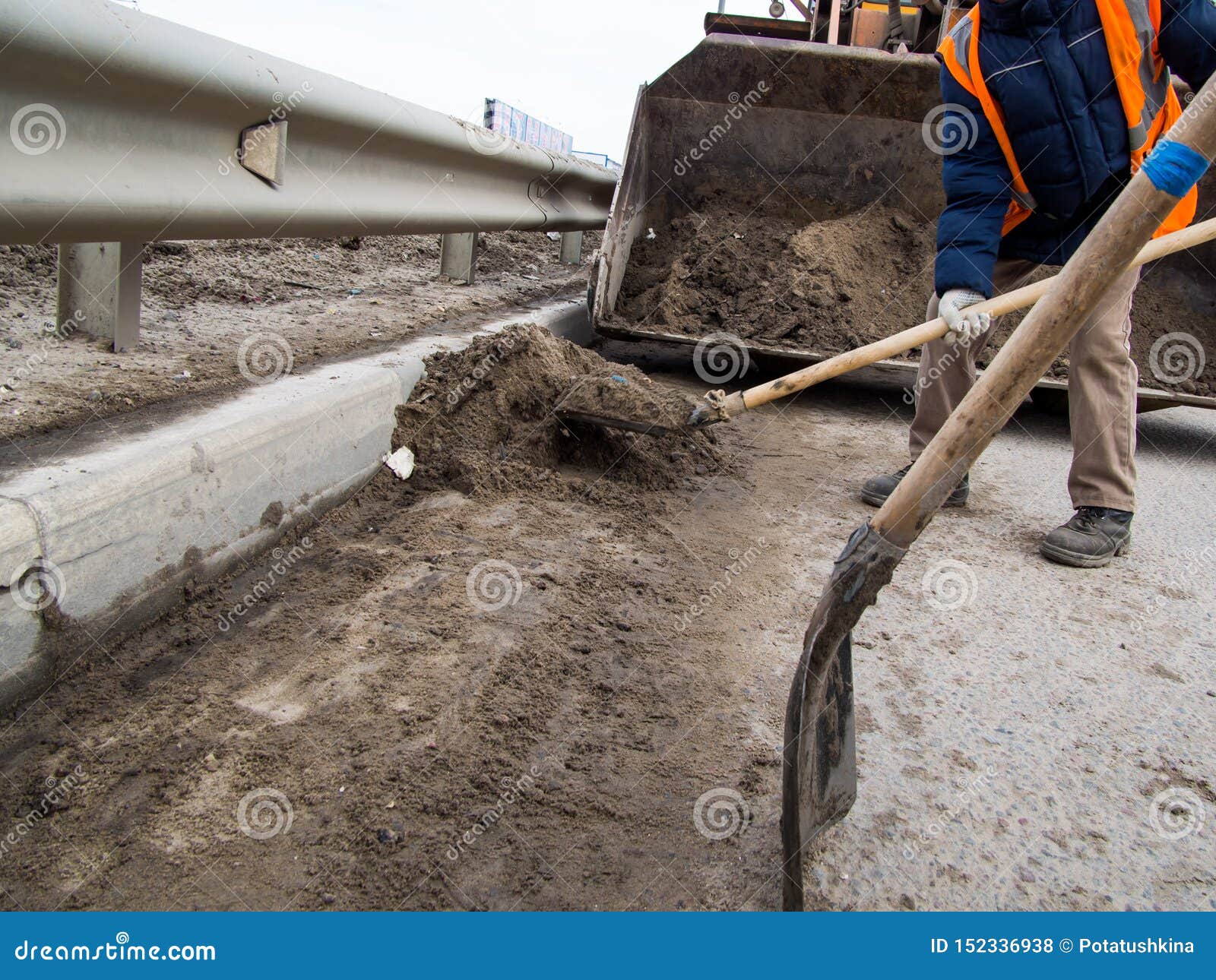 Cleaning the Roadside from the Sand in the Spring Stock Photo - Image ...