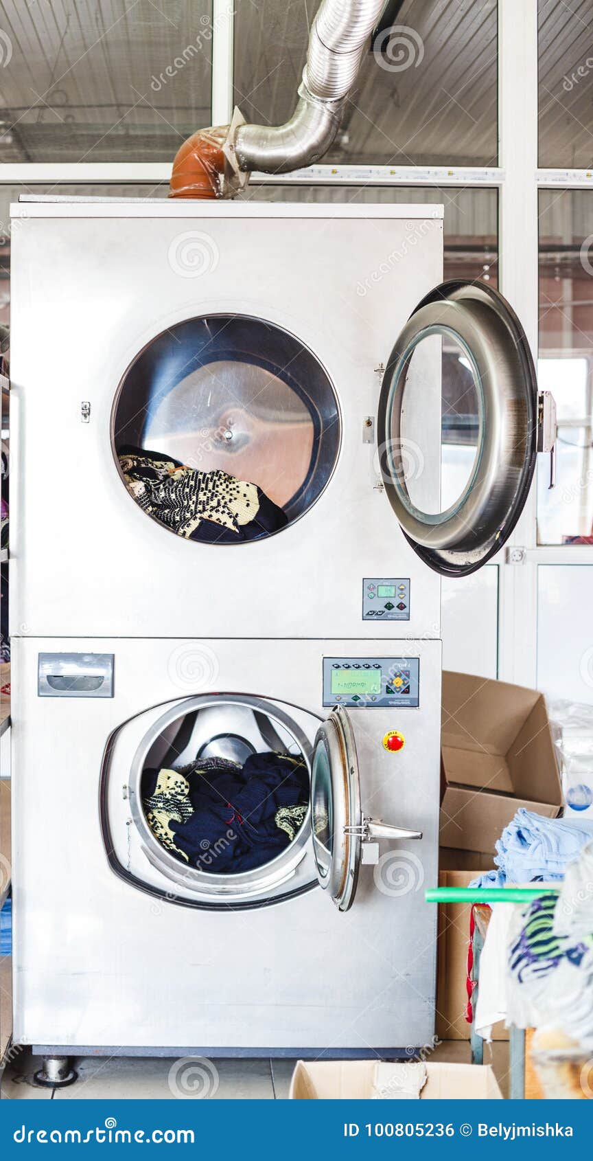 Cleaning Services with Industrial Laundry Washing Machine Stock Photo ...