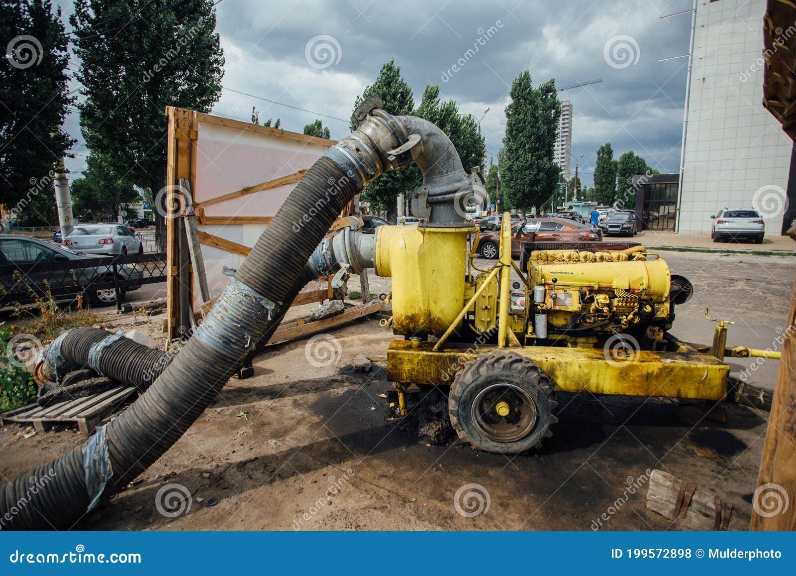 Cleaning Sewer Manholes by Specialized Pump Machine on the Street Stock ...