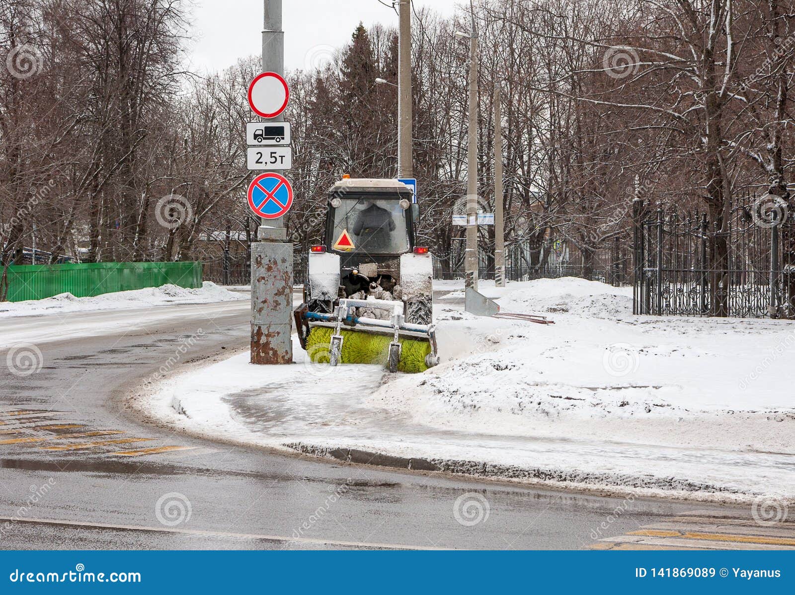 Cleaning Sidewalk after Snowfall with Help of Snow Removal Equipment ... Cleaning Sidewalk after Snowfall with Help of Snow Removal Equipment ...