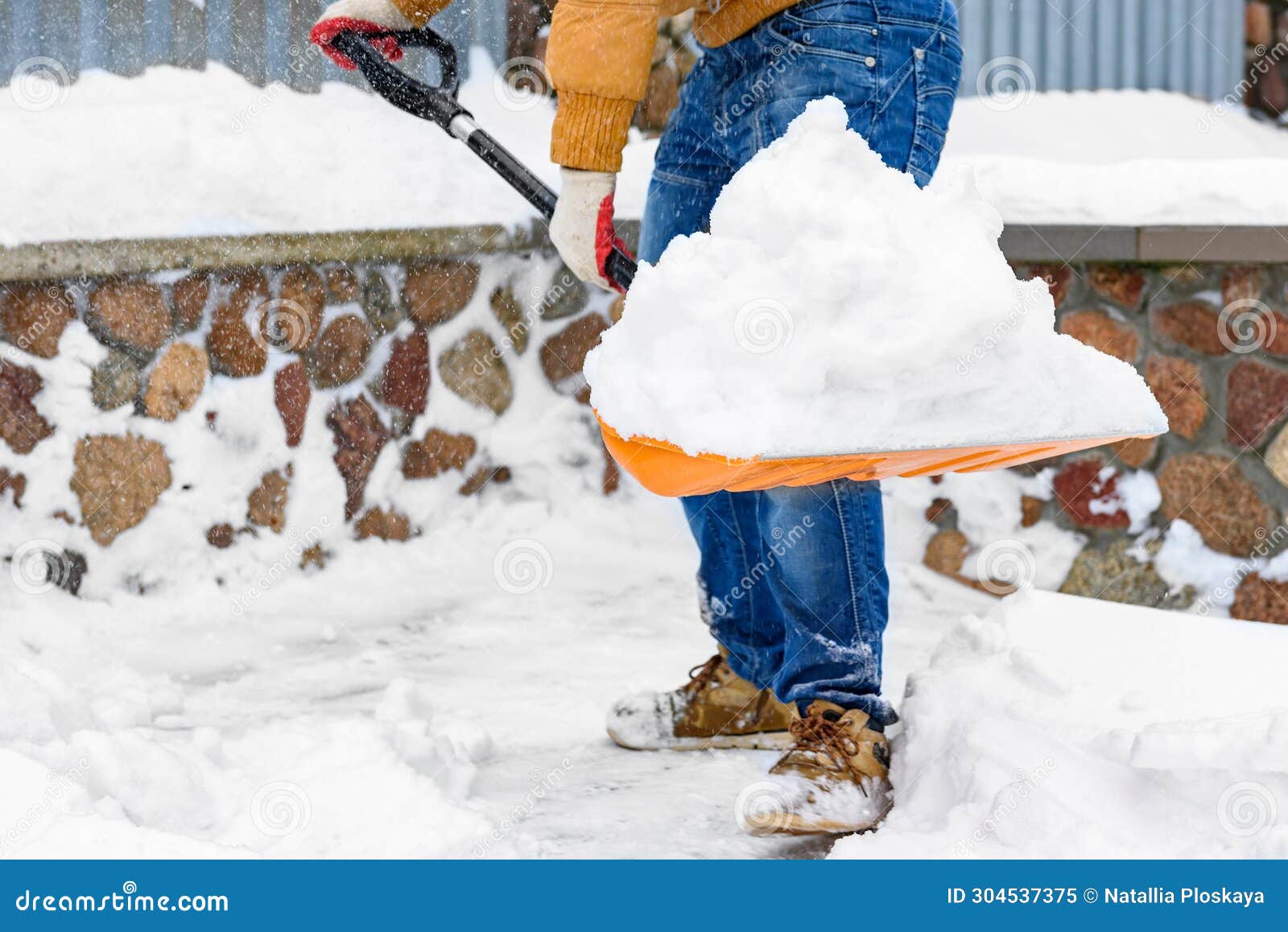 Cleaning Snow from Sidewalk and Using Snow Shovel. Stock Image - Image ...