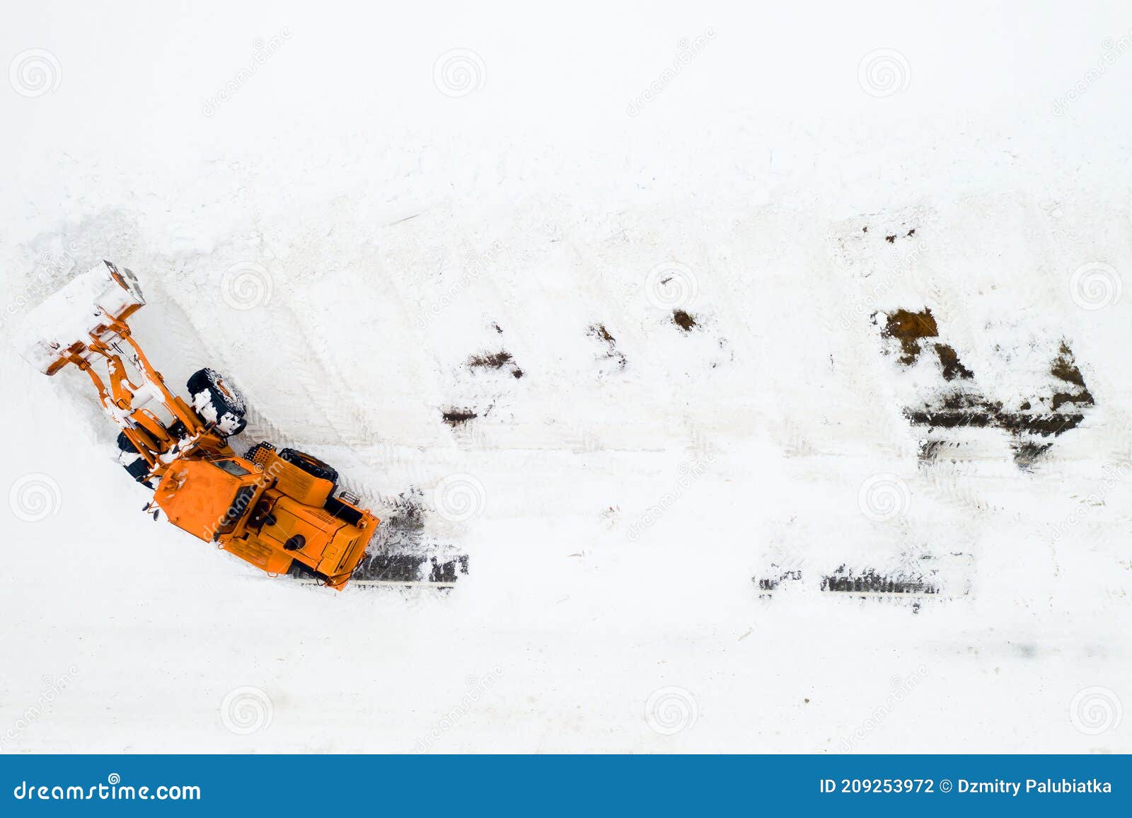 Cleaning Snow from the Streets after a Heavy Snowfall. Tractor Cleans ...