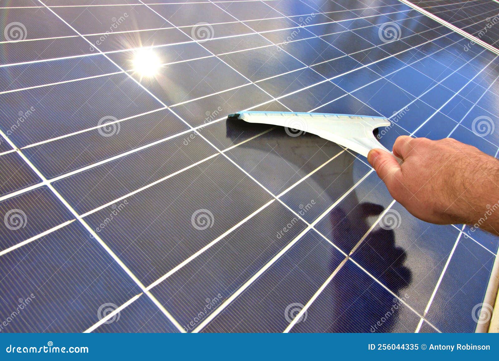 Cleaning solar panels stock image. Image of electricity - 256044335