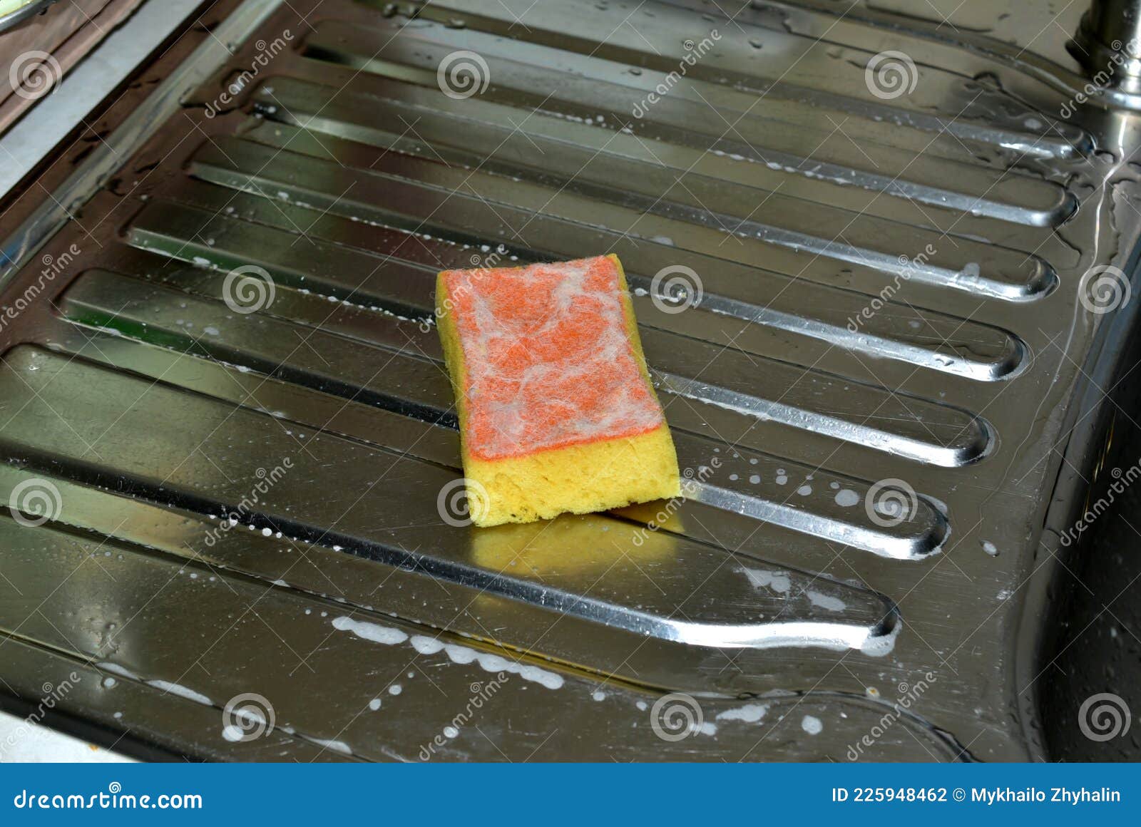 The Cleaning Sponge is on the Kitchen Sink. Stock Photo - Image of ...