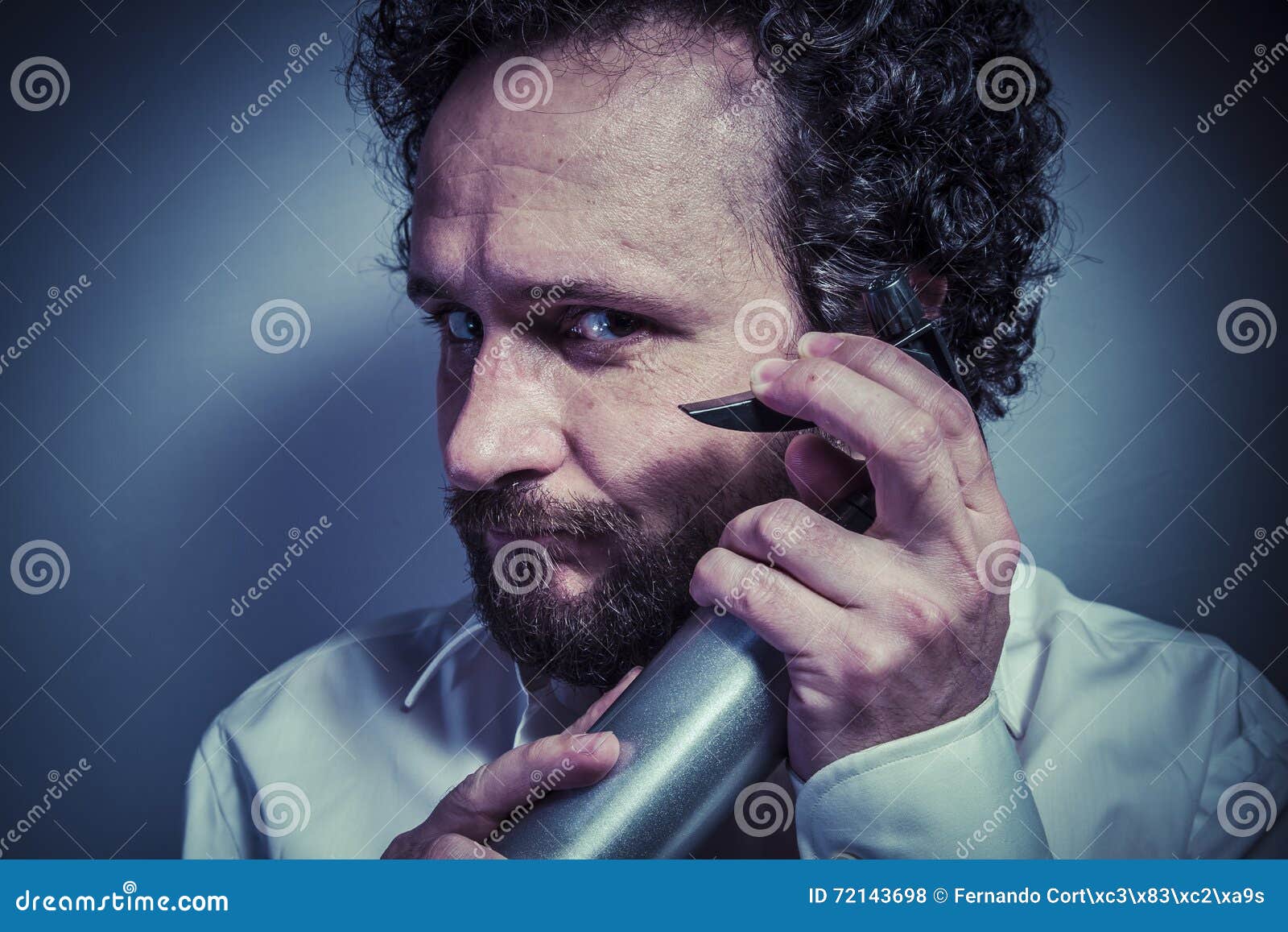 Cleaning Spray, Man with Intense Expression, White Shirt Stock Photo ...
