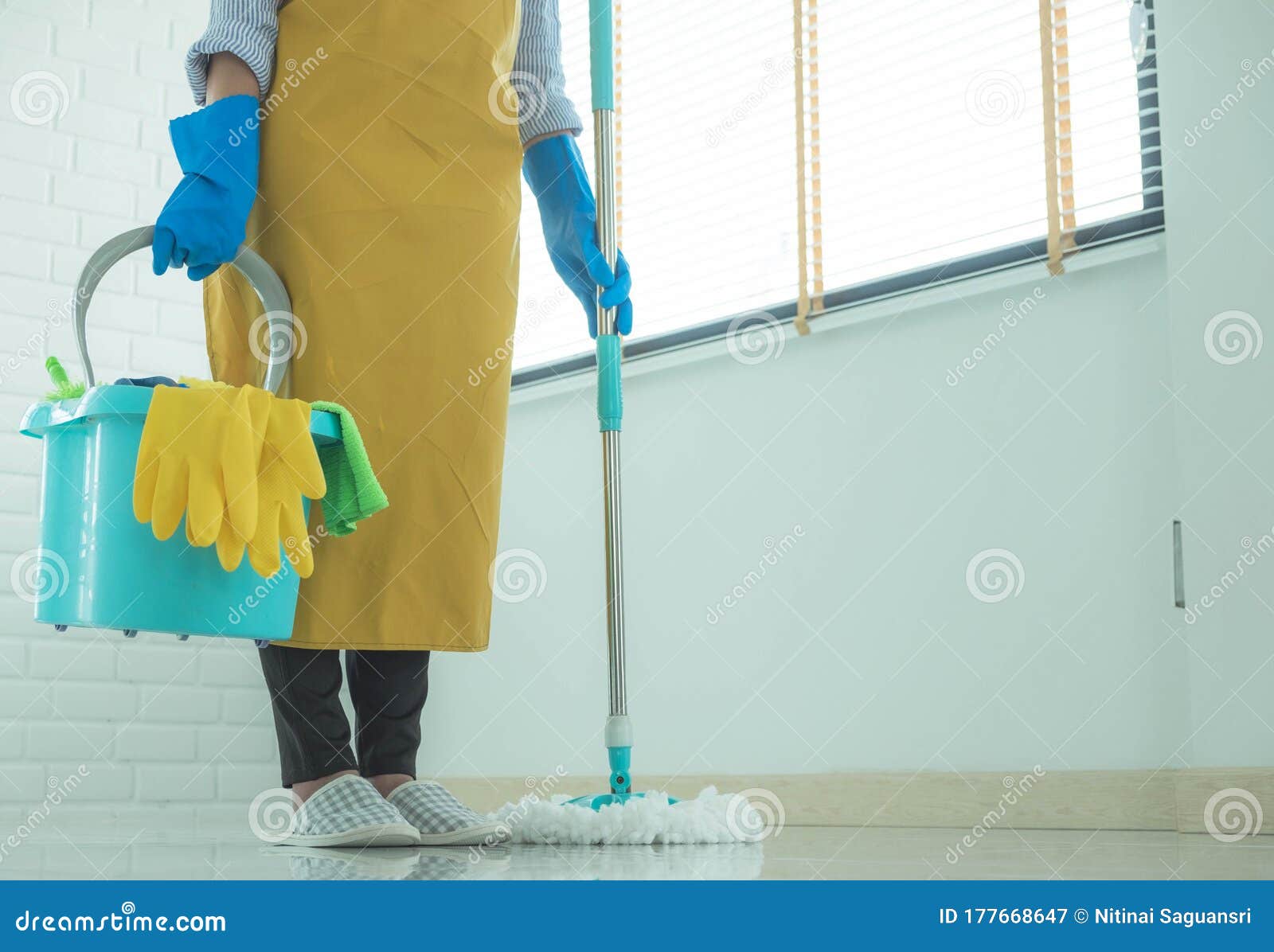 The Cleaning Staff Use Mops on the Surface and Use Cleaning Agents ...