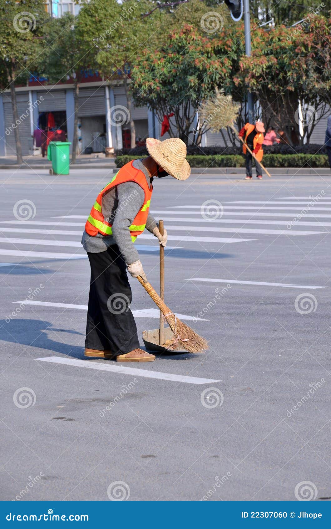 Cleaning street editorial image. Image of clear, strawhat - 22307060