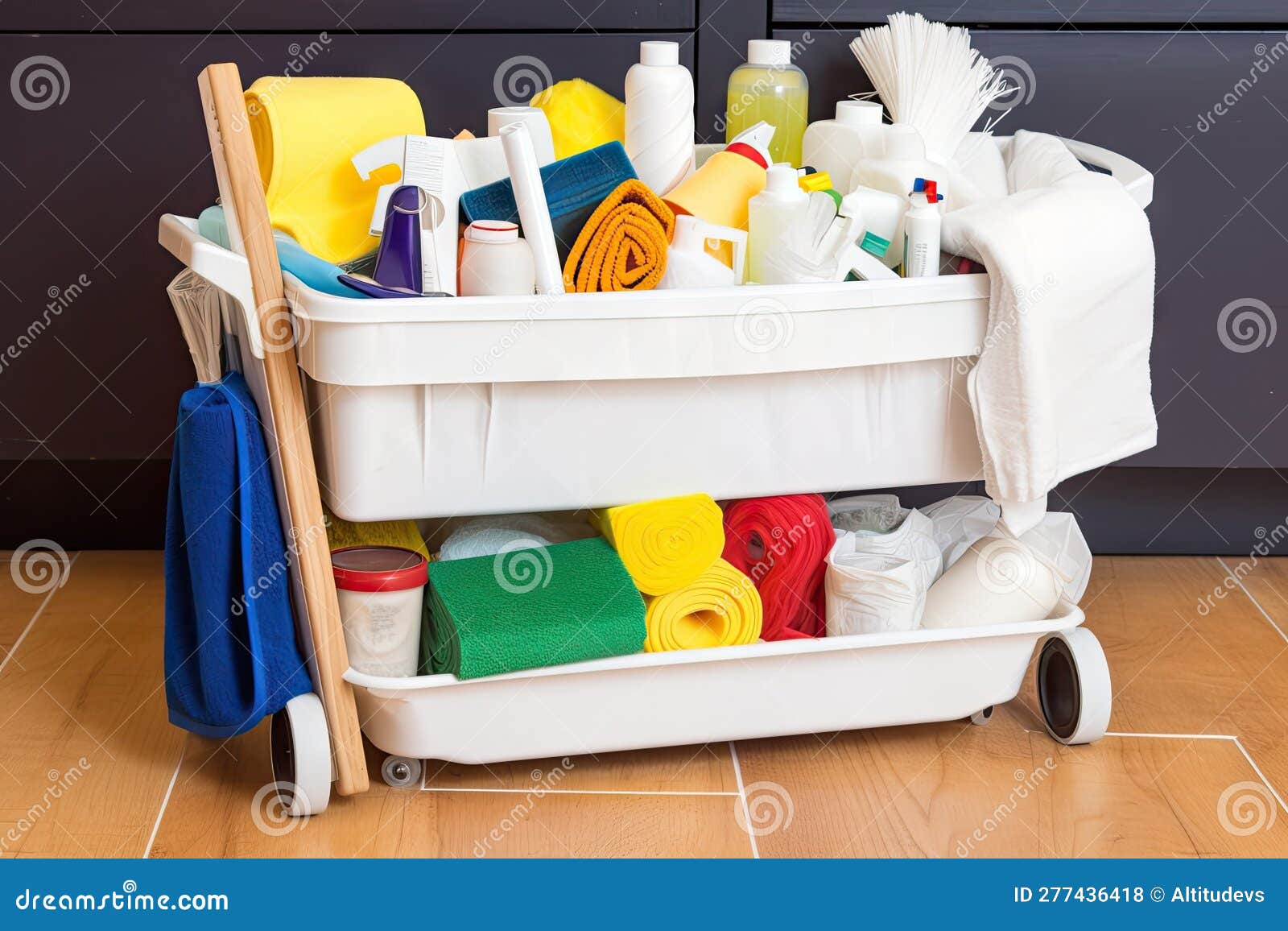 Cleaning Supplies Bin Overflowing with Rollers, Mops, Sponges and ...