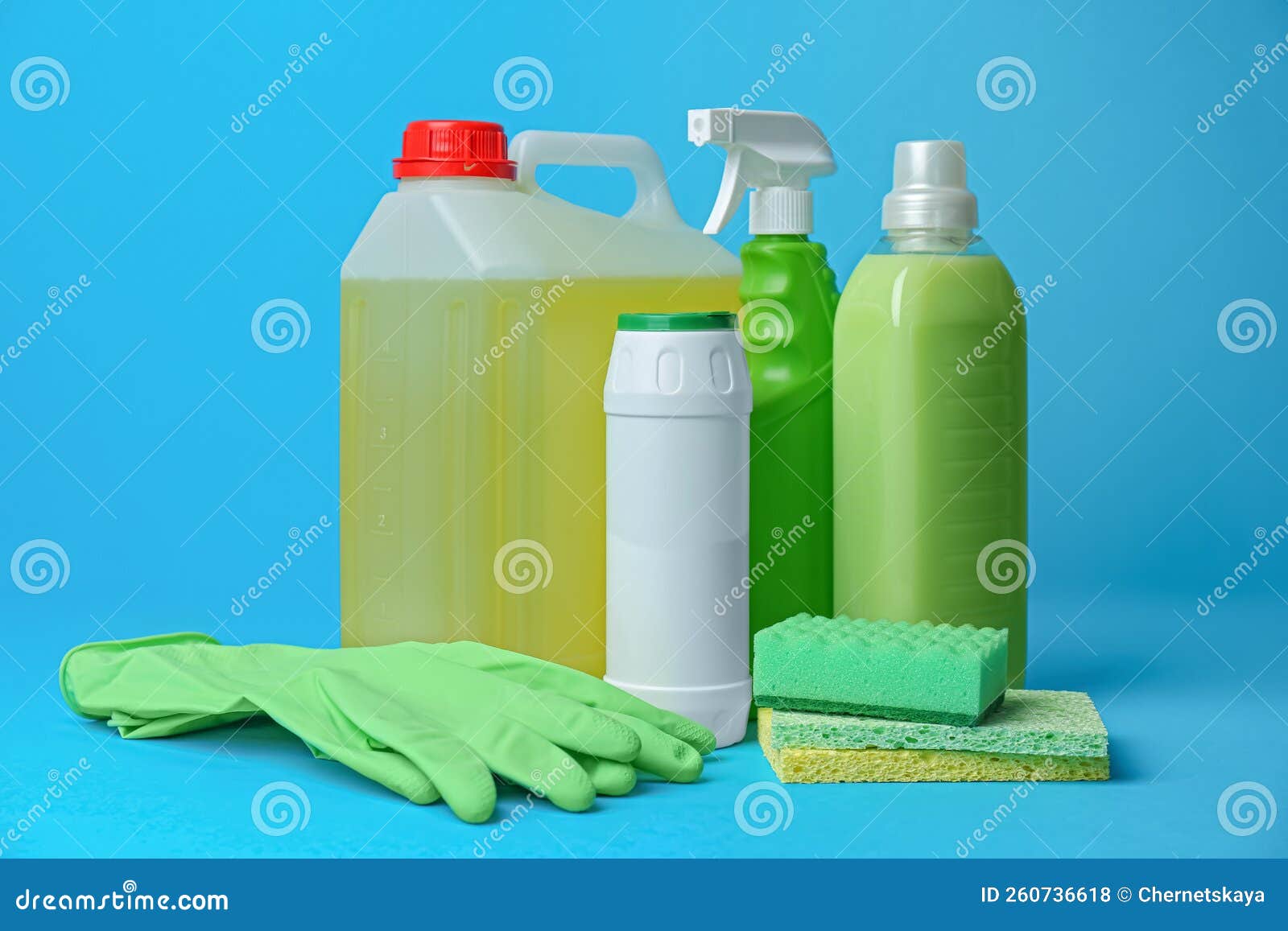 Cleaning Supplies and Tools on Light Blue Background Stock Photo ...