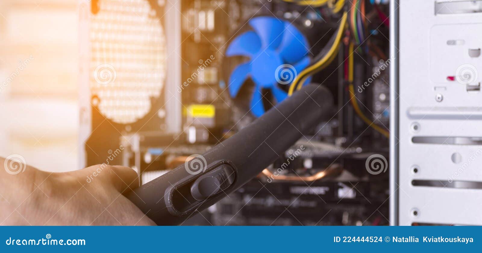 Cleaning the System Unit of a Desktop Computer from Dust with a Vacuum ...