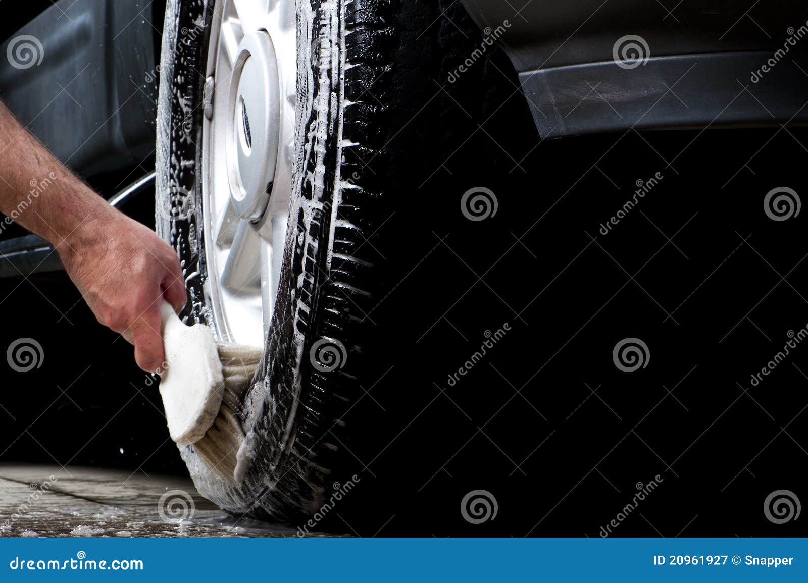 Cleaning Tire in a Car Wash Stock Image - Image of washing, automobile ...