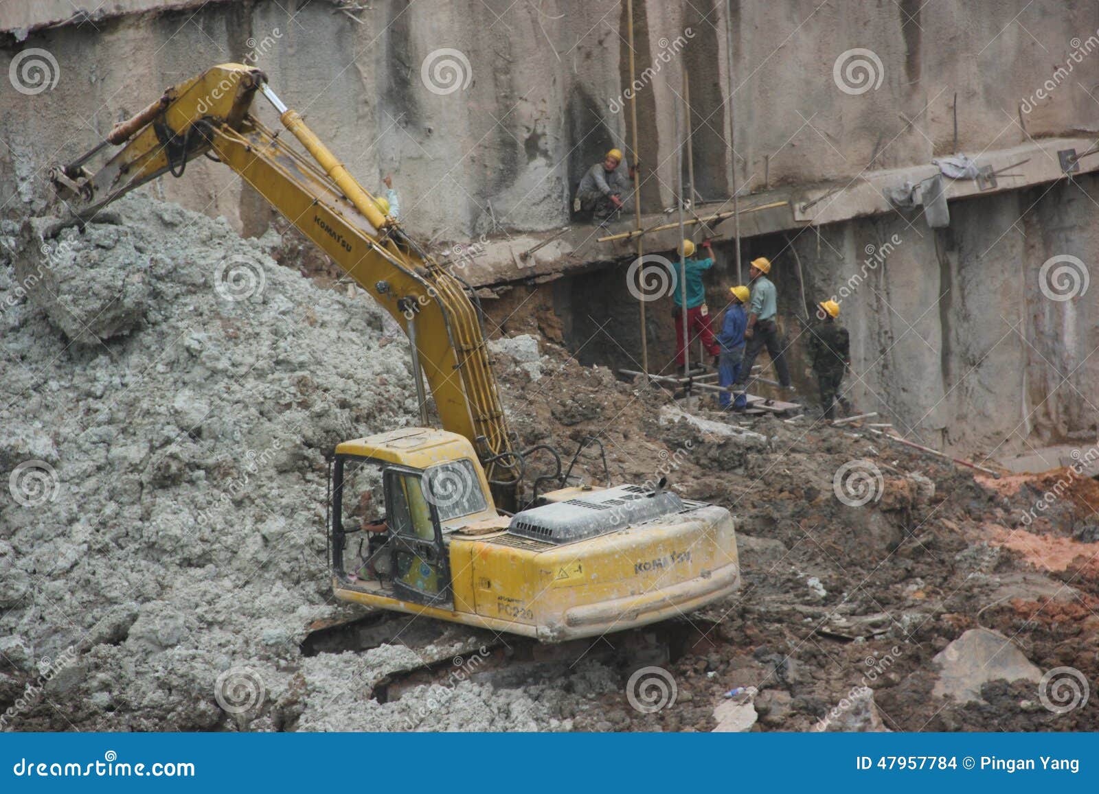 Are Cleaning Up the Dirt of the Excavator at the SHENZHEN Construction ...