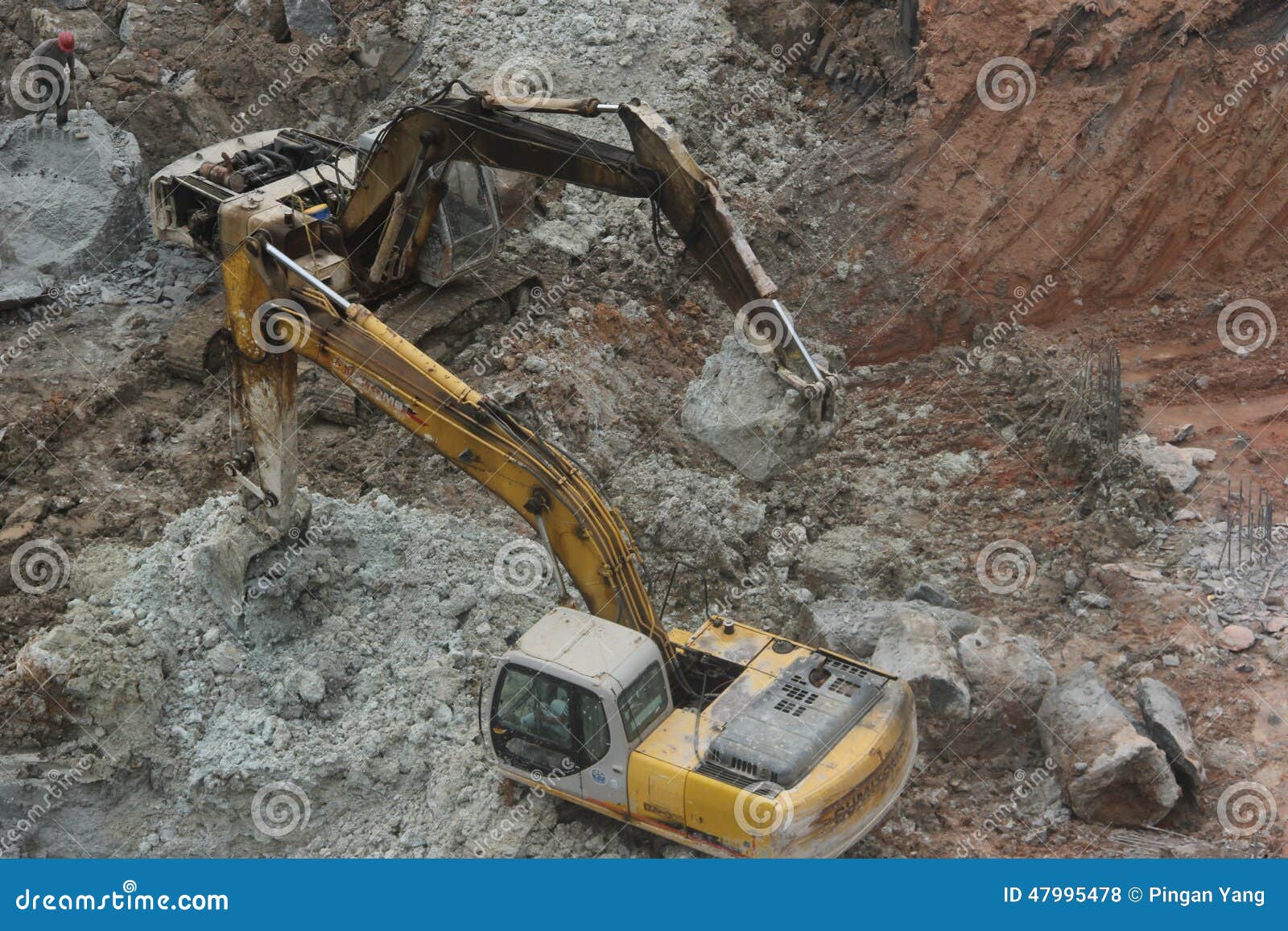 Are Cleaning Up the Dirt of the Excavator at the SHENZHEN Construction ...