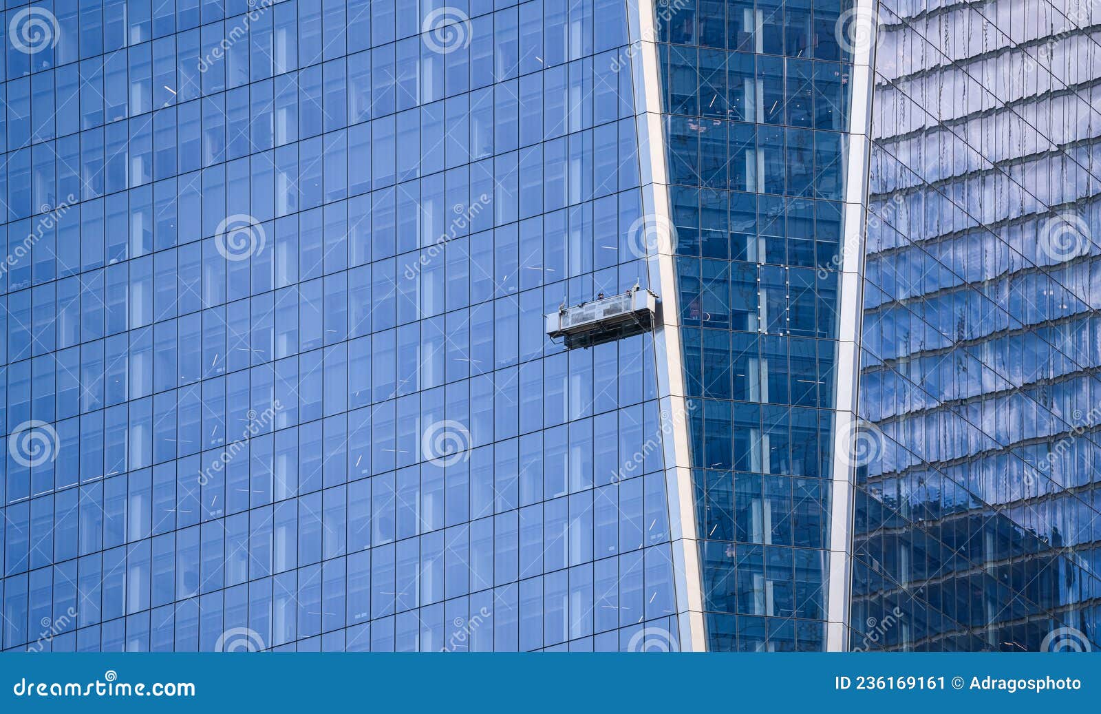 Cleaning the Windows of Some Tall Skyscraper Buildings. Workers are ...