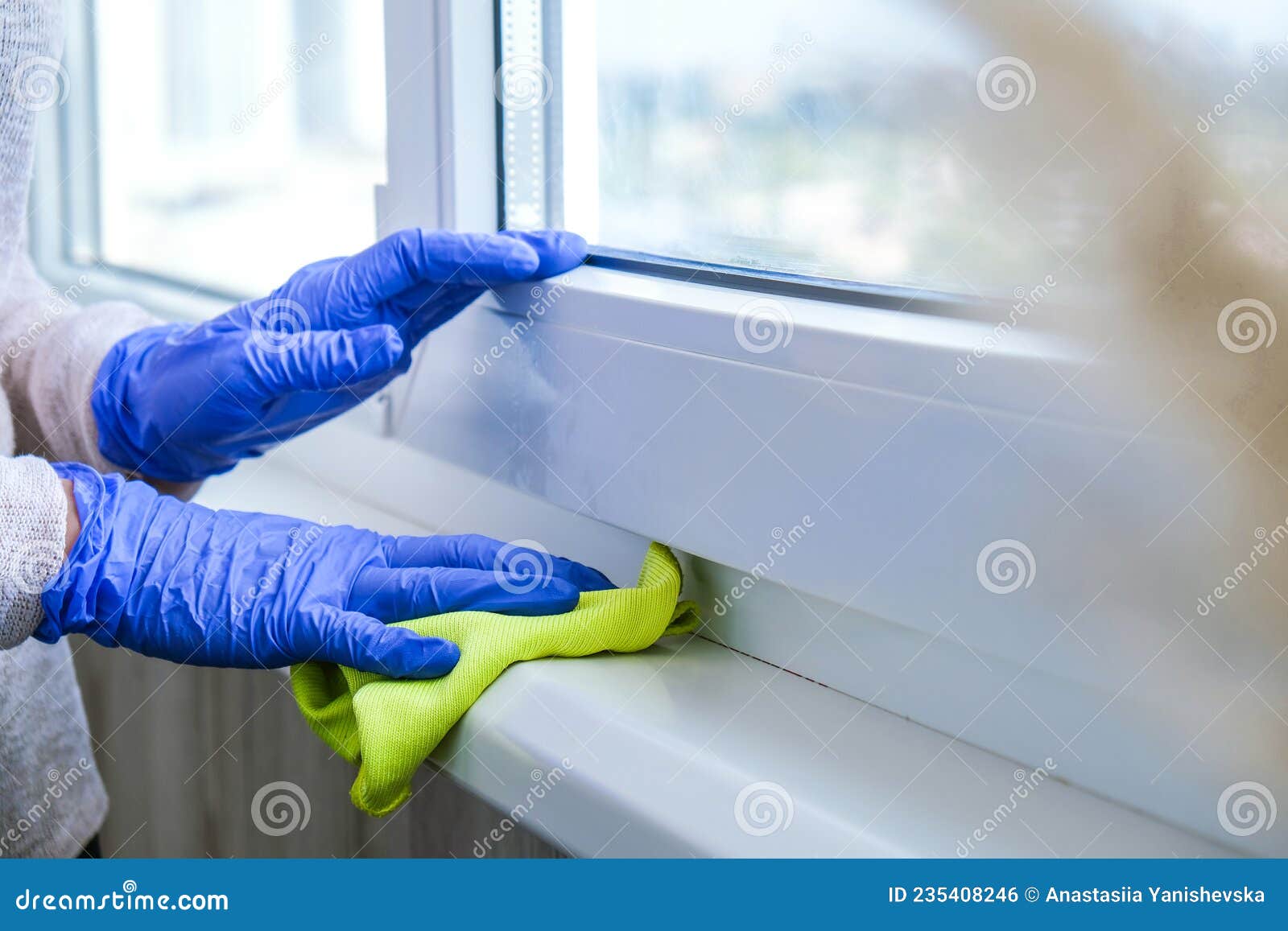 Cleaning the Windowsill Wiping Dust by Blue Microfiber Cloth for ...