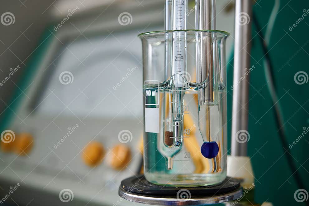 Laboratory Setup with Beaker Containing Liquid and Measuring ...