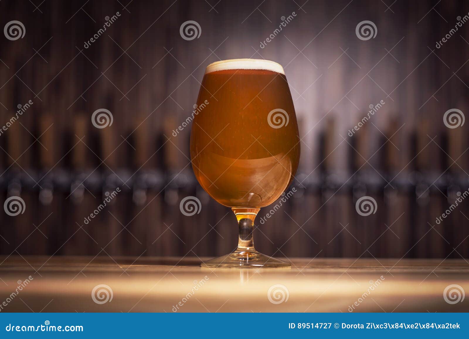 Clear Beer with Foam on the Background of Taps Stock Image - Image of ...