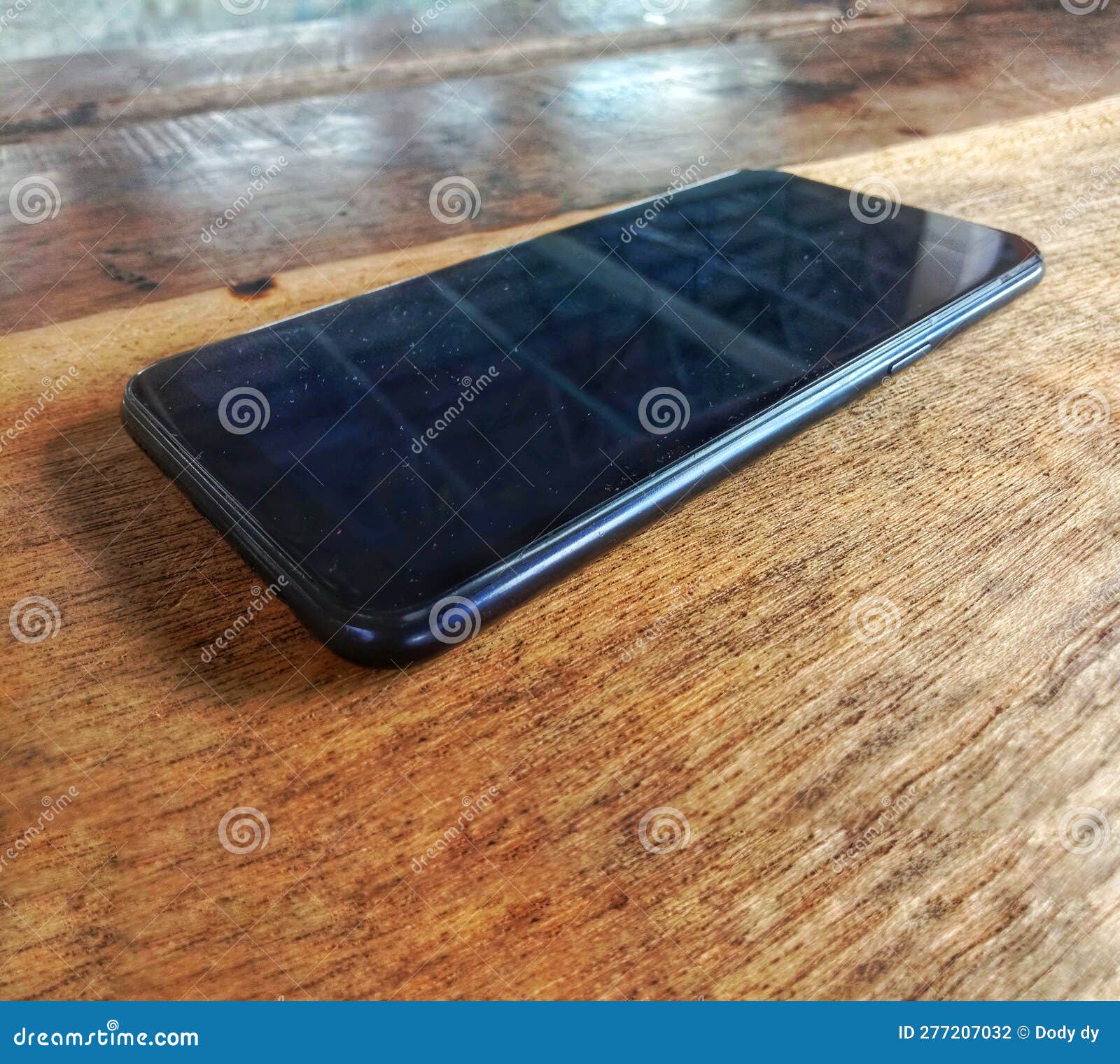 Clear Black Cell Phone, Reflected in the Roof& X27;s Shadow Stock Photo ...