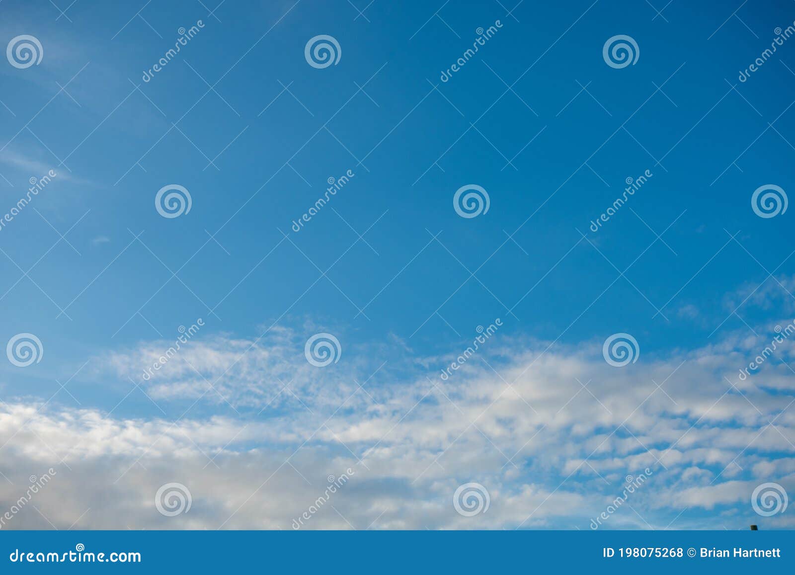 A Clear Blue Sky with Clouds on the Bottom of the Frame for Sky ...