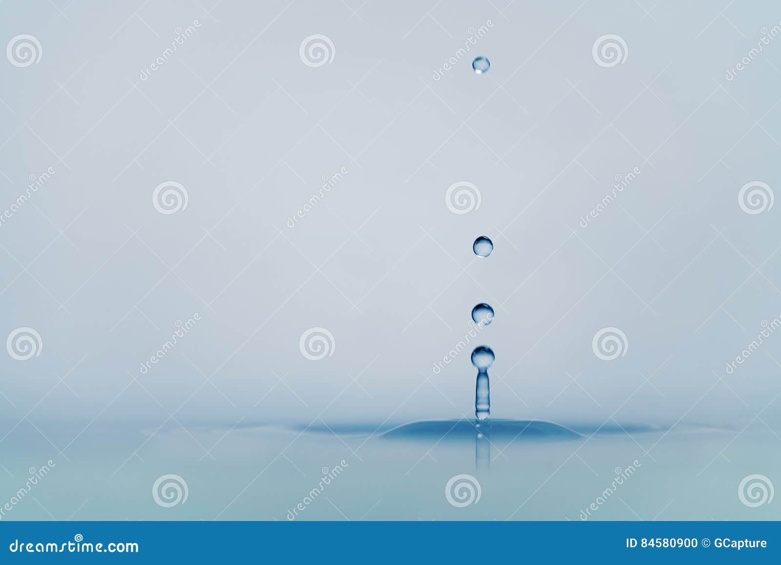 Clear Blue Water Drop with Ripple on Surface Stock Photo - Image of ...