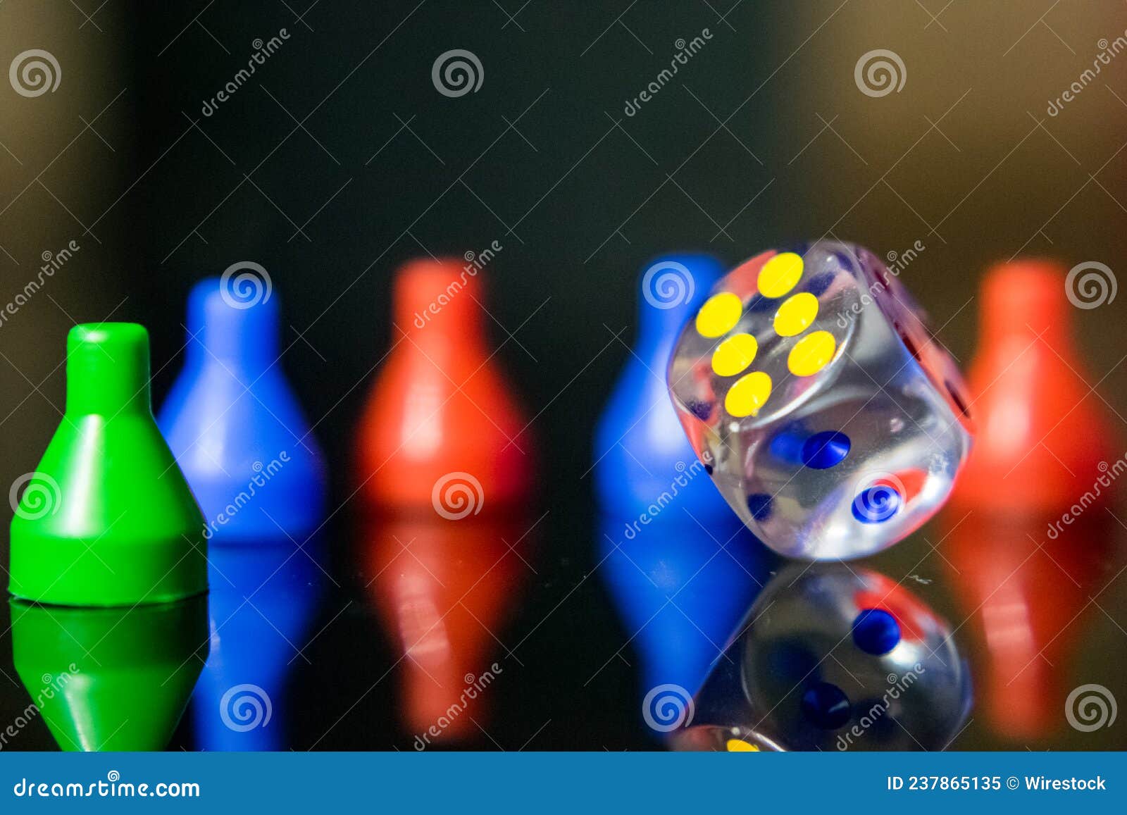 A Clear Dice and Tokens in a Reflective Surface Stock Image - Image of ...