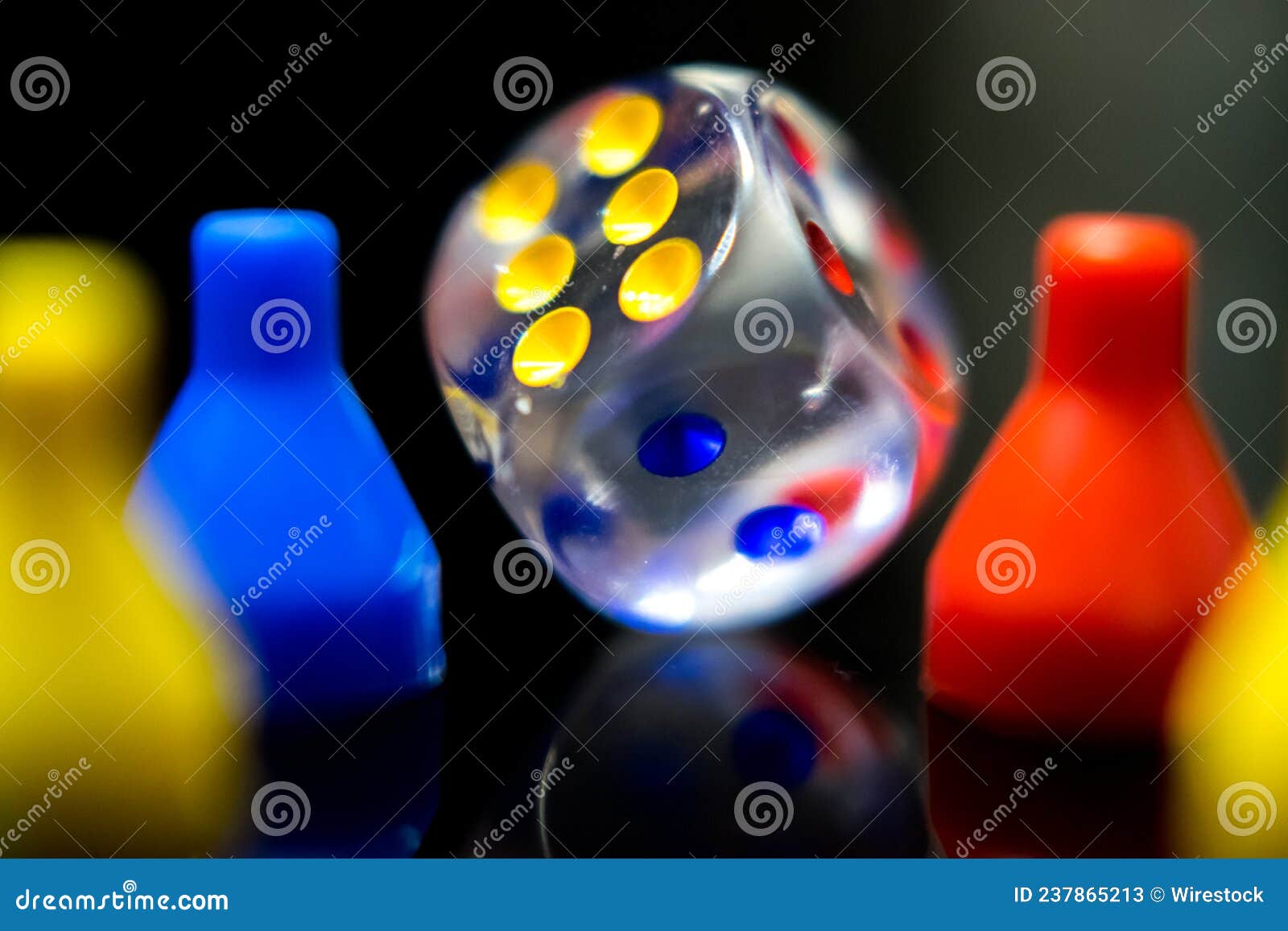 A Clear Dice and Tokens in a Reflective Surface Stock Image - Image of ...