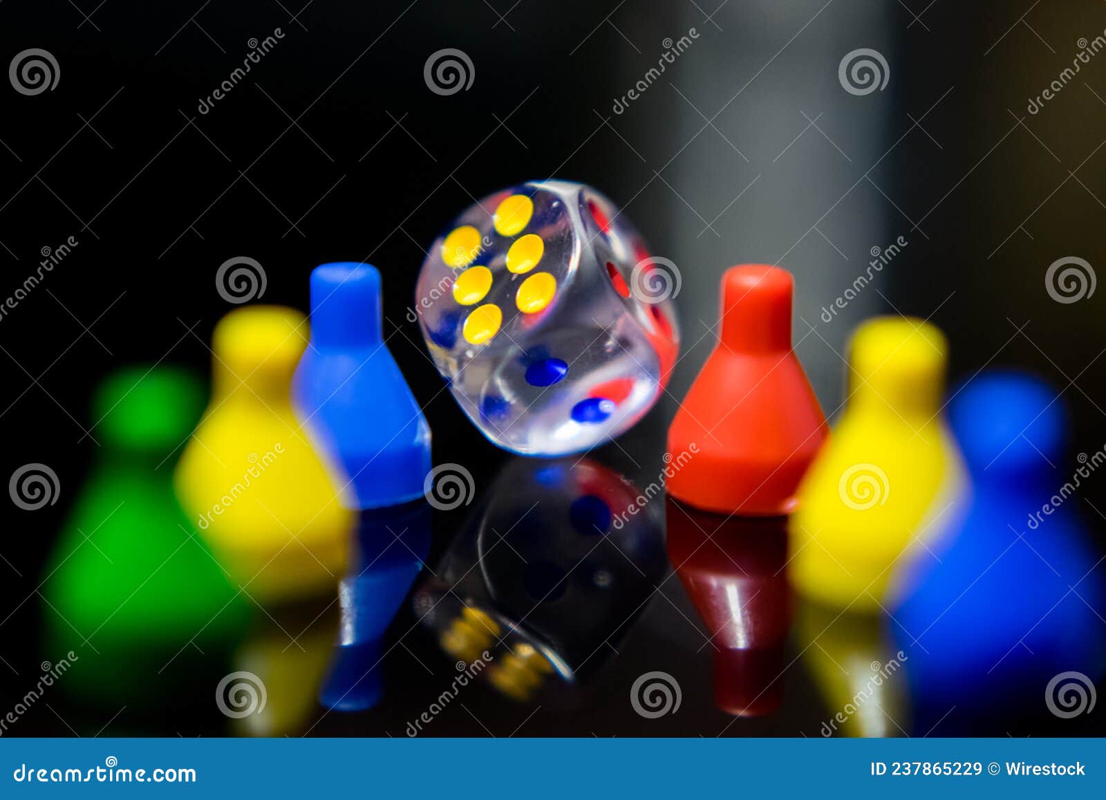 A Clear Dice and Tokens in a Reflective Surface Stock Image - Image of ...