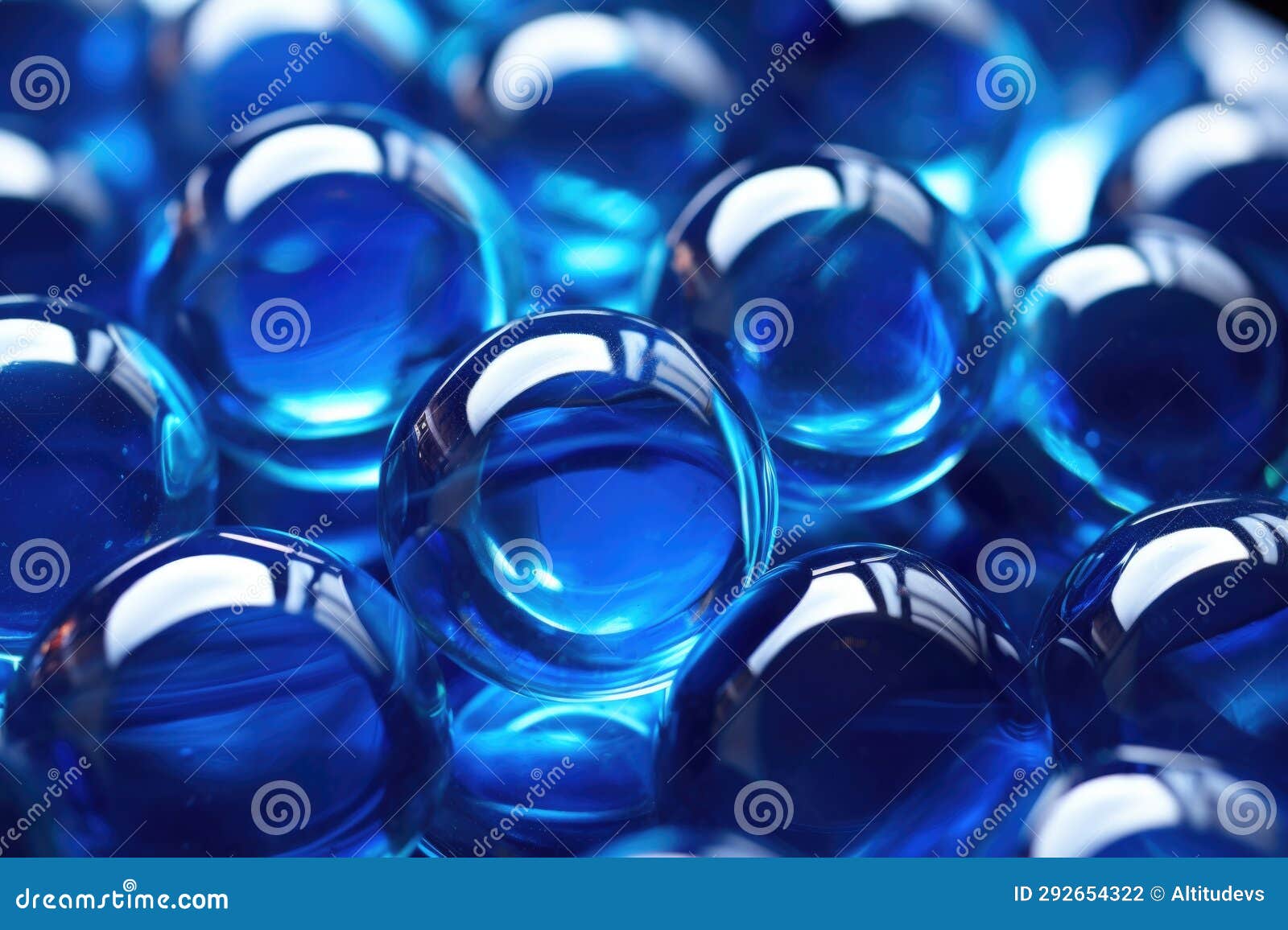 A Clear Glass Filled with Shiny Blue Marbles Stock Photo - Image of ...