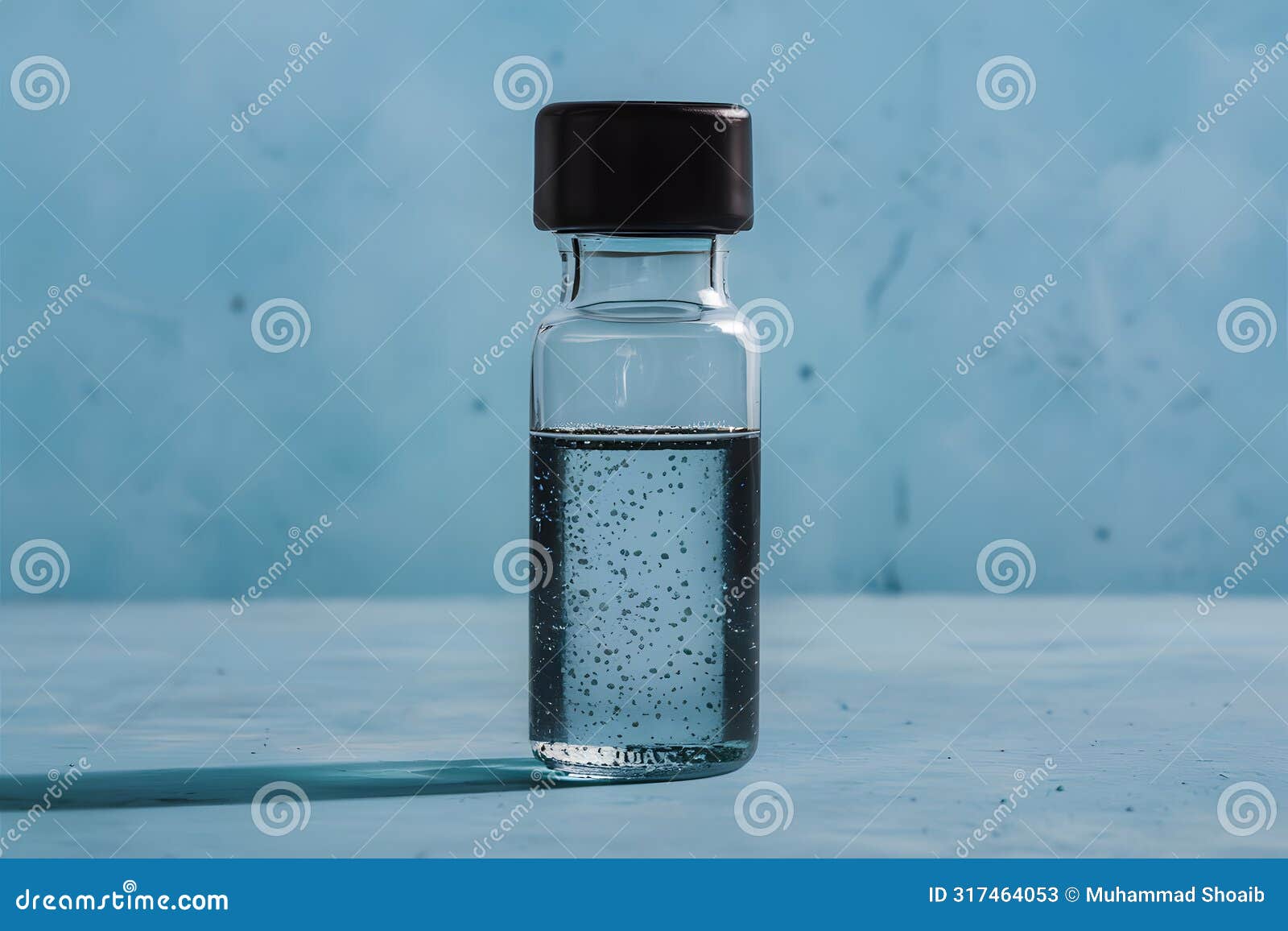 Clear Glass Vial with Dark Cap, Light Blue Background, Textured Liquid ...