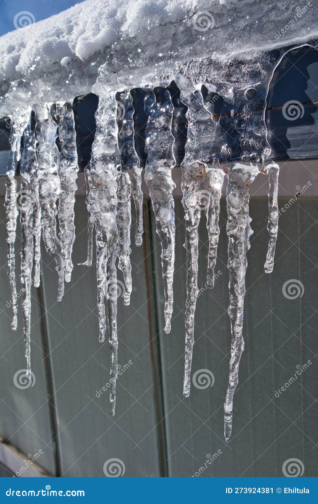 Clear Icicles Dripping Water from Eaves at Springtime Stock Image ...