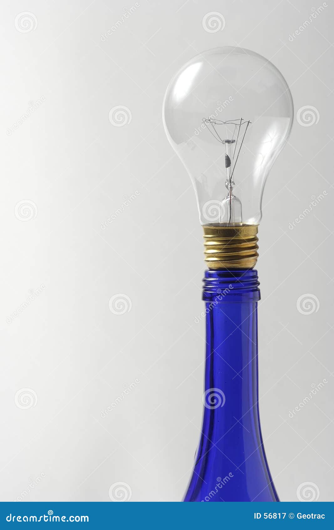 A Clear Light Bulb on Blue Oil Bottle Stock Image - Image of lamp, blue ...