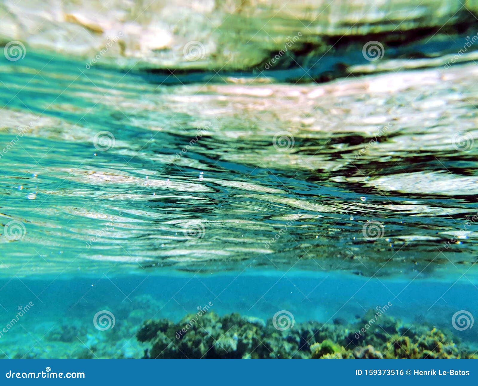 Clear Ocean surface stock photo. Image of reflection - 159373516