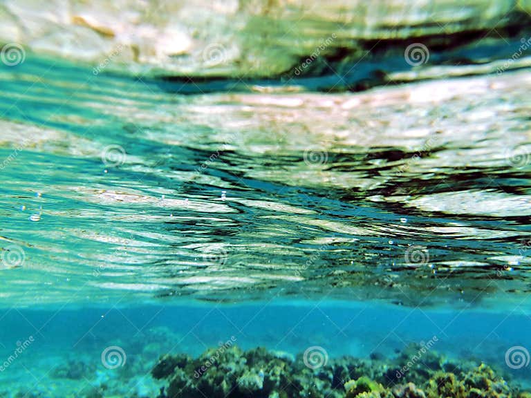 Clear Ocean surface stock photo. Image of reflection - 159373516
