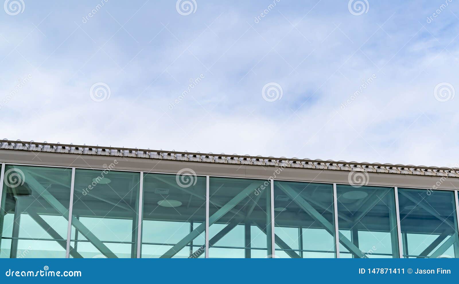 Clear Panorama Looking Up at an Empty Skybridge with a Cloudy Blue Sky ...