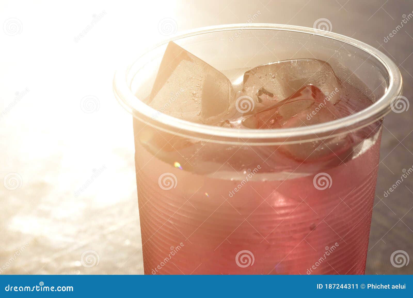 The Clear Plastic Cup Inside Has a Red Nectar Filled with Ice Placed on ...
