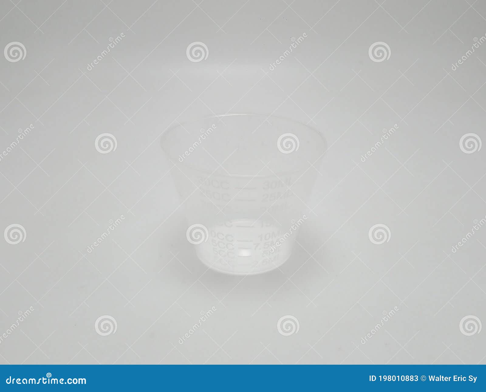Clear Plastic Measuring Cup Stock Image - Image of small, accurate ...