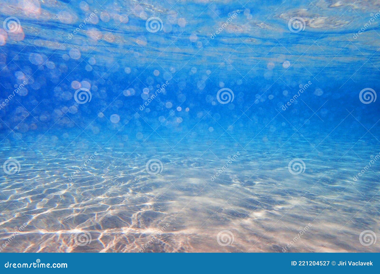 Clear sand under sea water stock image. Image of natural - 221204527