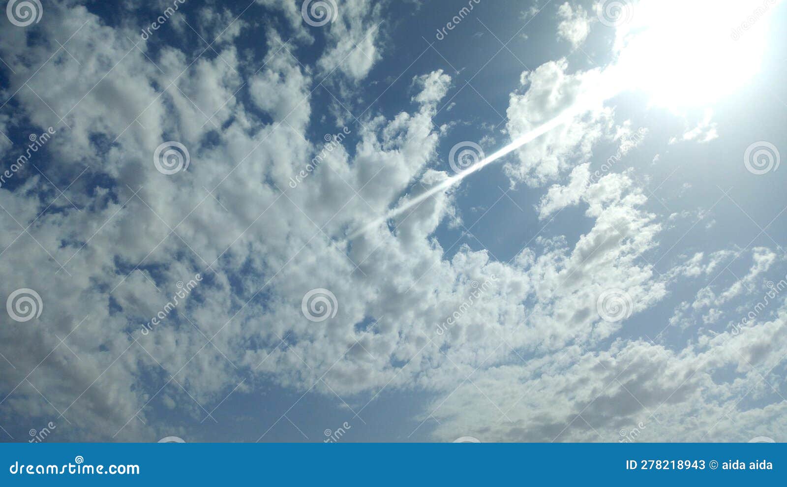 A Clear Sky Adorned with White Summer Clouds Stock Image - Image of ...