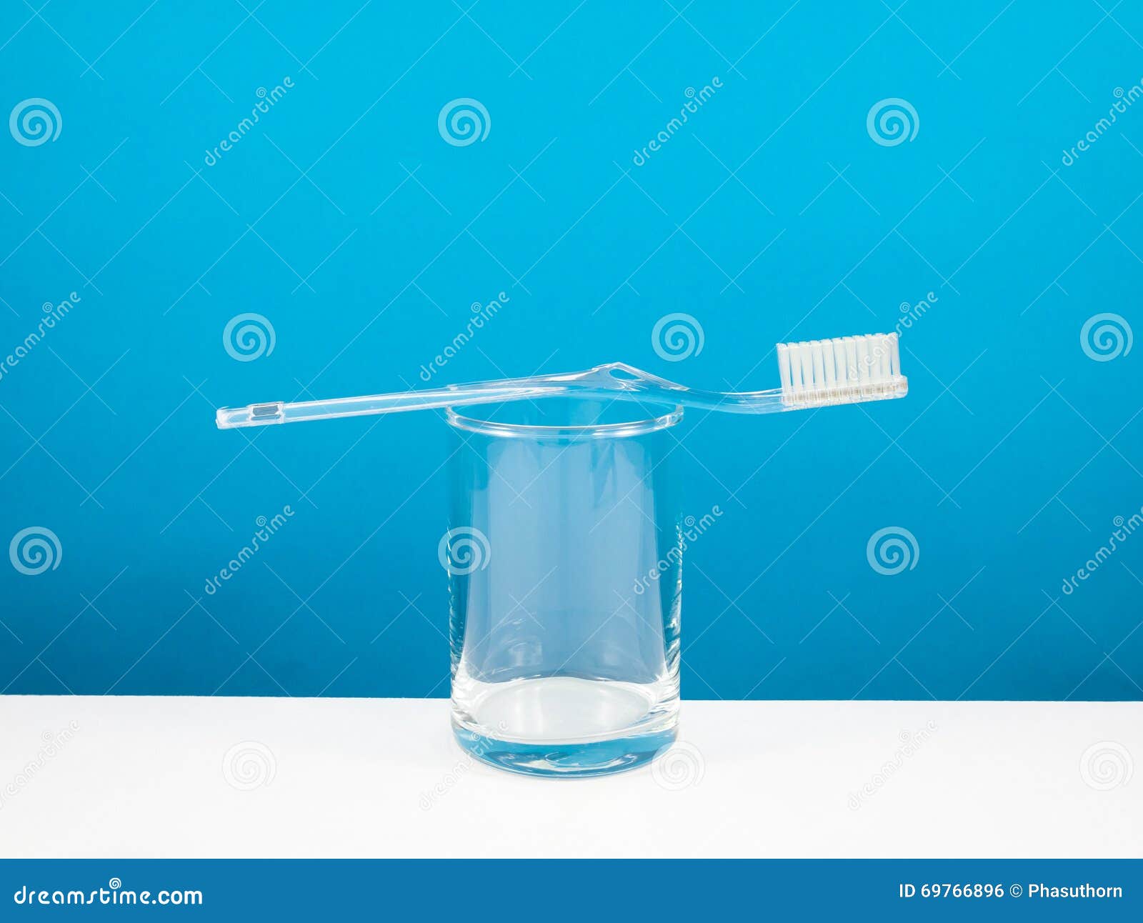 The Clear Toothbrush with Small Glass Stock Photo - Image of brush ...