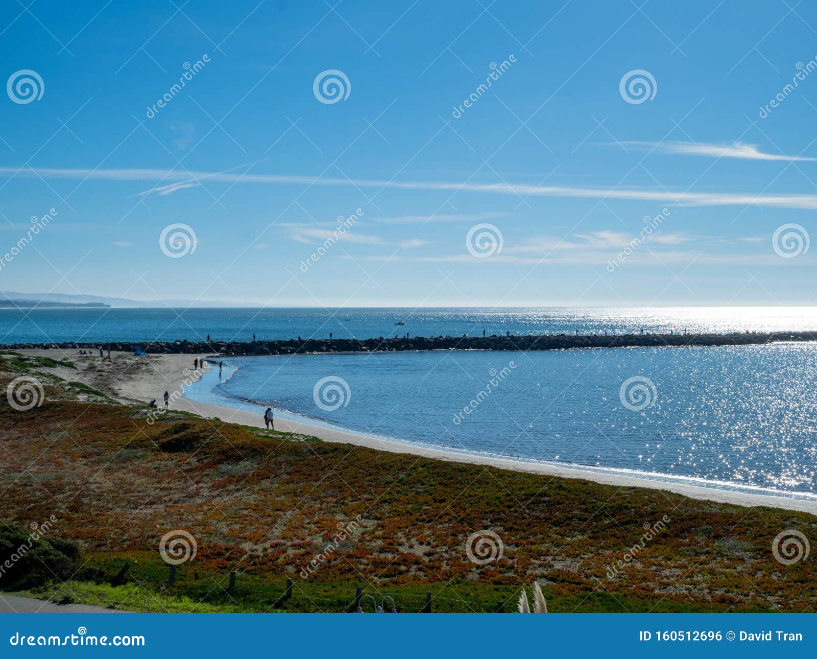 Clear View of Beach, Rock Pathway, Grass, Rock Barrier in Sea Stock ...