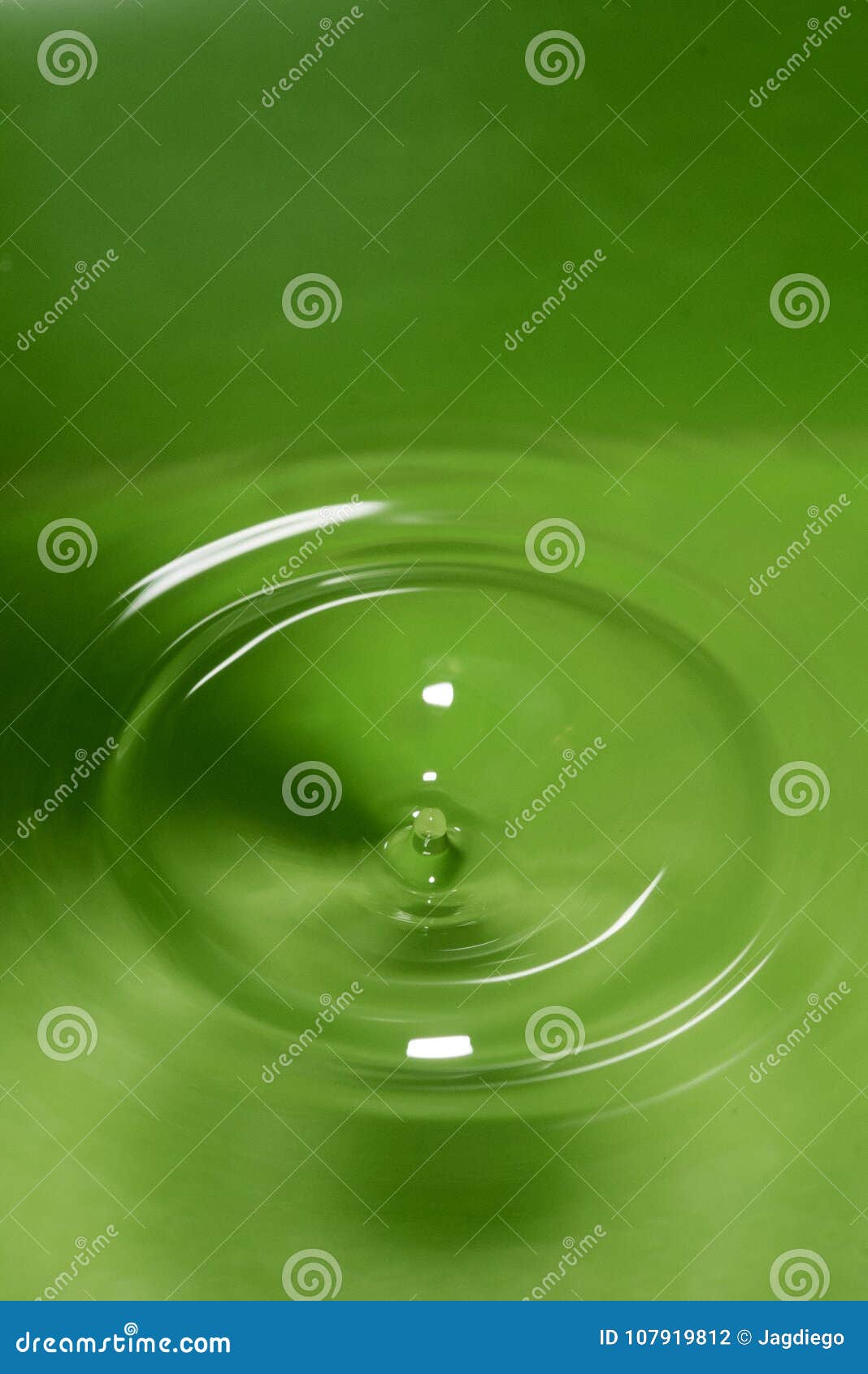 Clear Water Drop into Green Container Stock Photo - Image of container ...